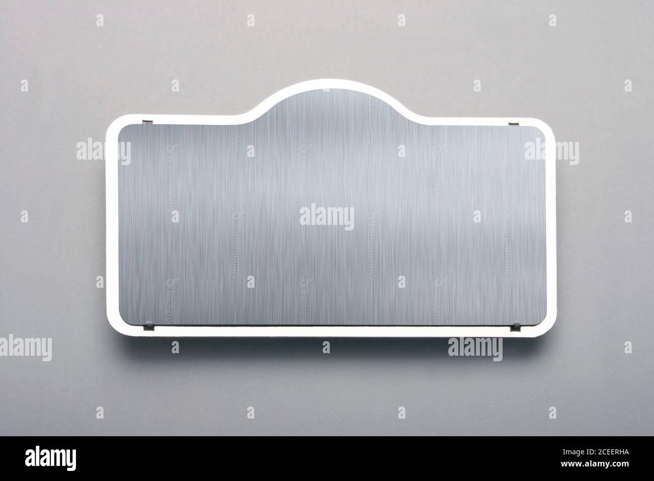 Metal or wooden name plate for insertion into collar or shirt pocket ...