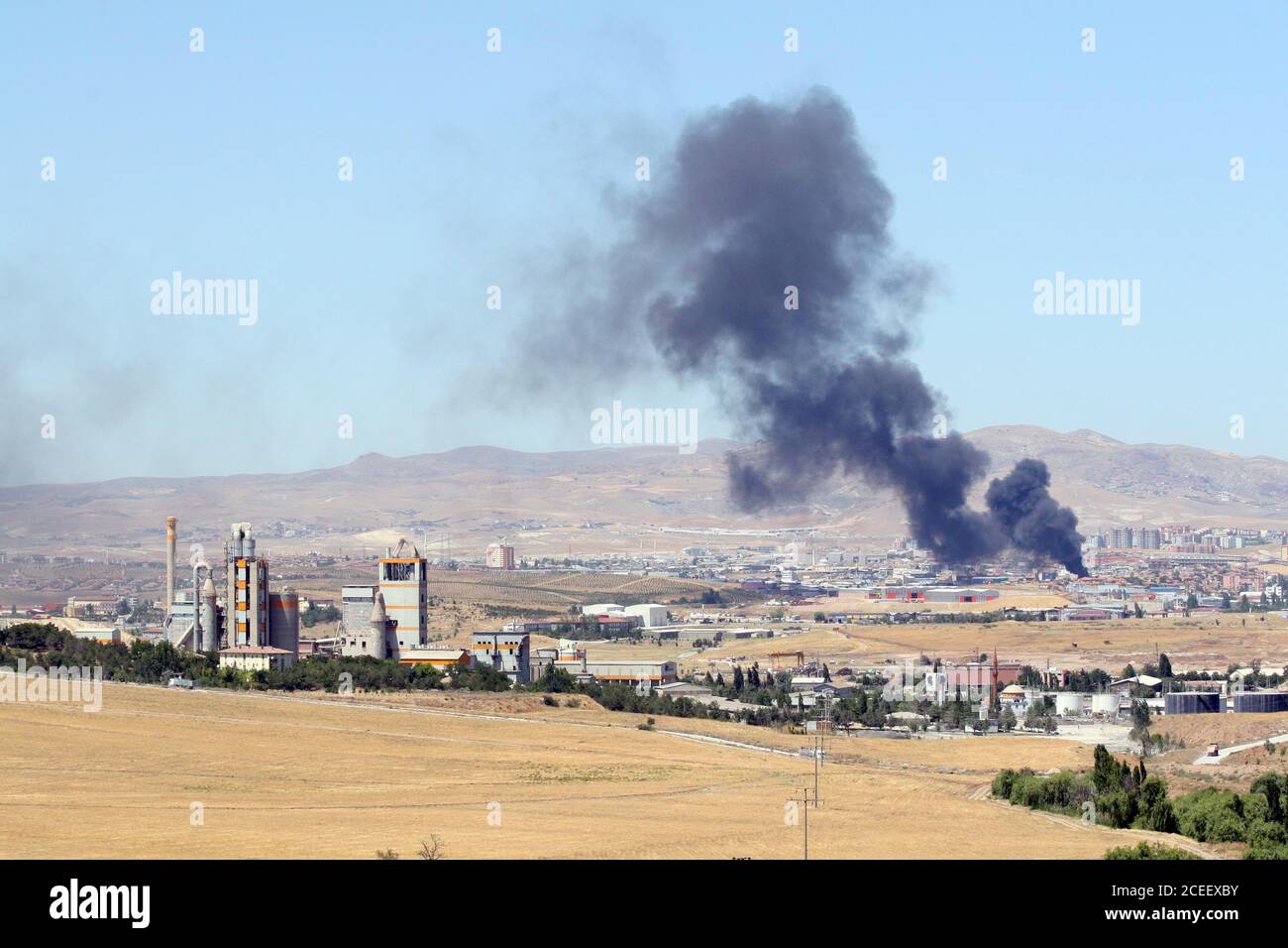 Fire, black fumes and air pollution in heavy industrial production and ...