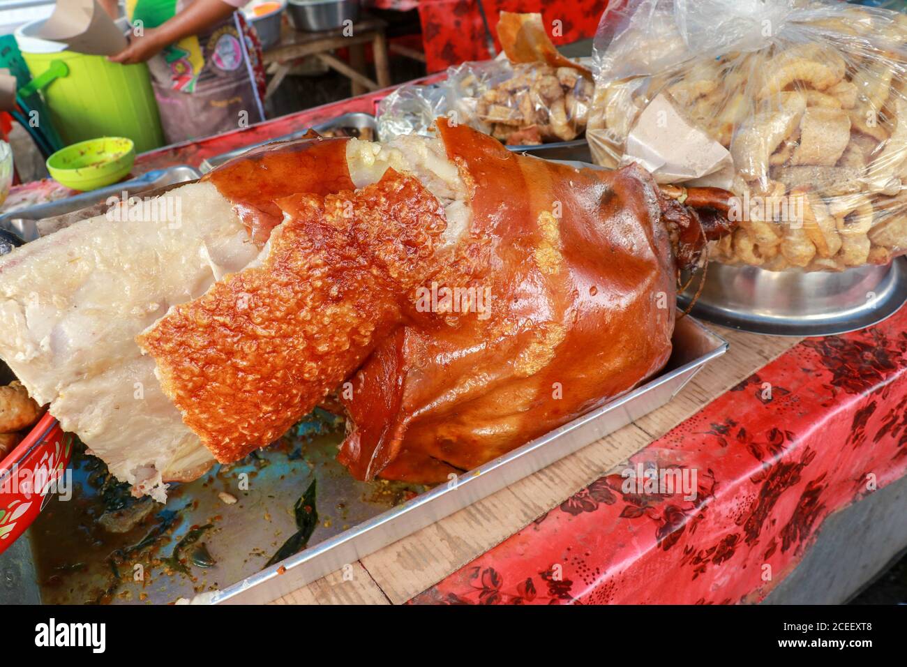 Grilled pig on the market of Bali, Indonesia, close up Stock Photo - Alamy