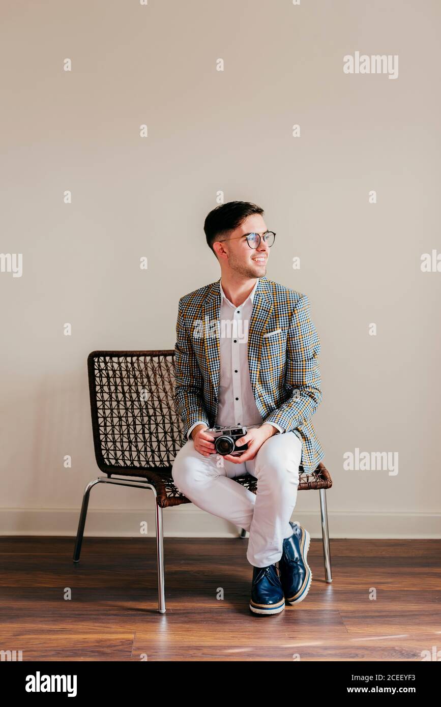 Portrait man on chair hi-res stock photography and images - Alamy