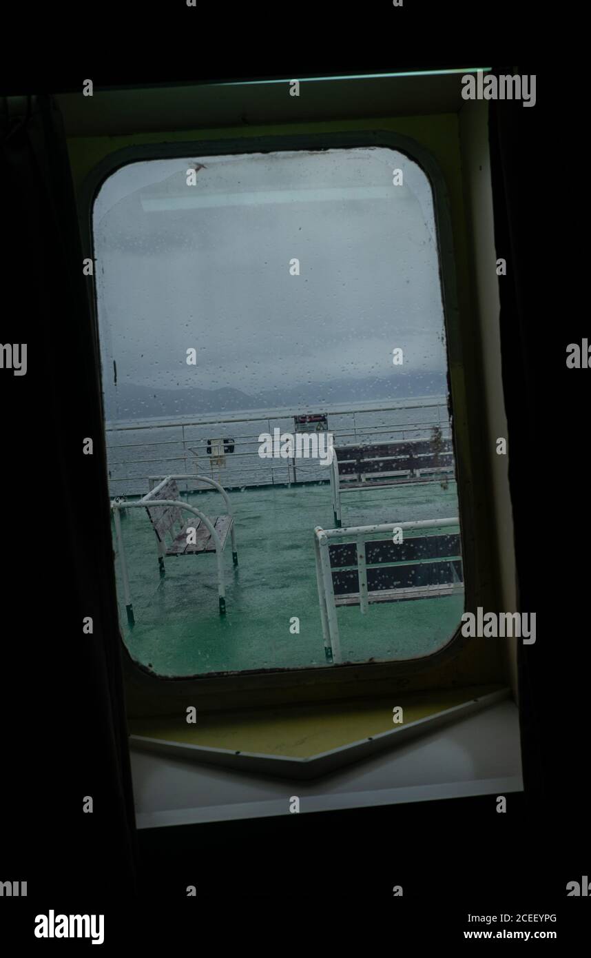 Patagonian ferry window in a storm Stock Photo - Alamy