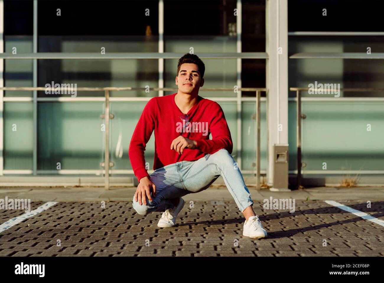 Young hispanic man in bright hi-res stock photography and images - Alamy