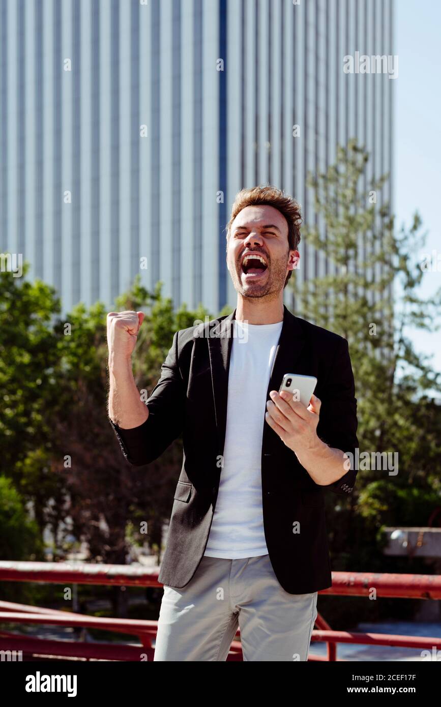 Rejoicing man hi-res stock photography and images - Alamy