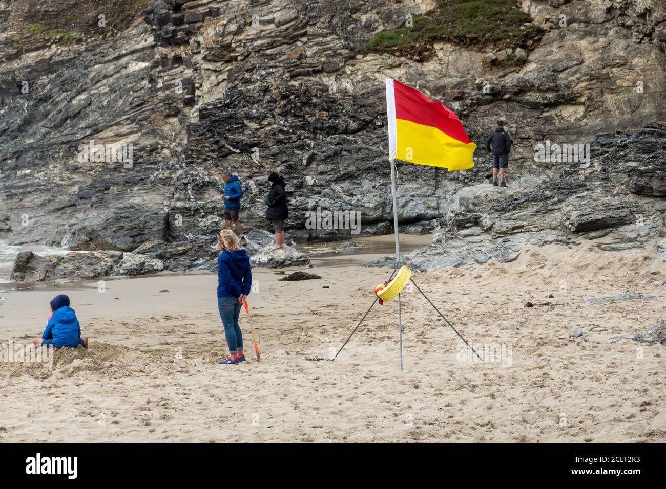 Surf flag, UK beach Stock Photo - Alamy