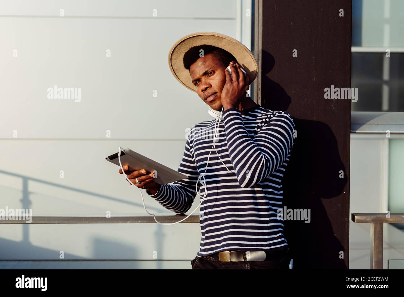 Relaxed man listening to music Stock Photo - Alamy