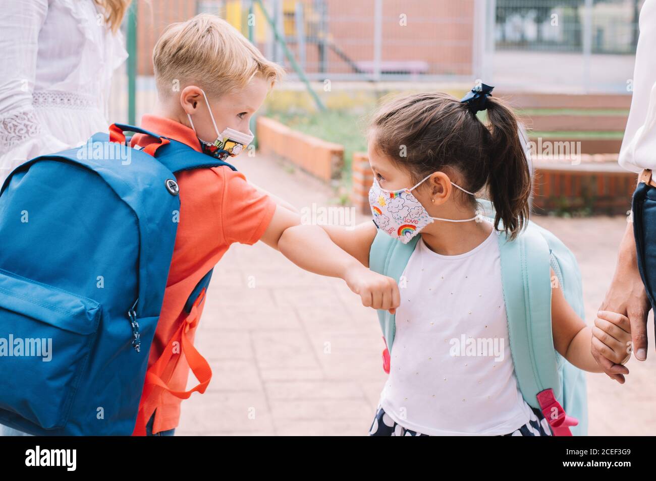 Children with face mask going back to school after covid-19 and ...