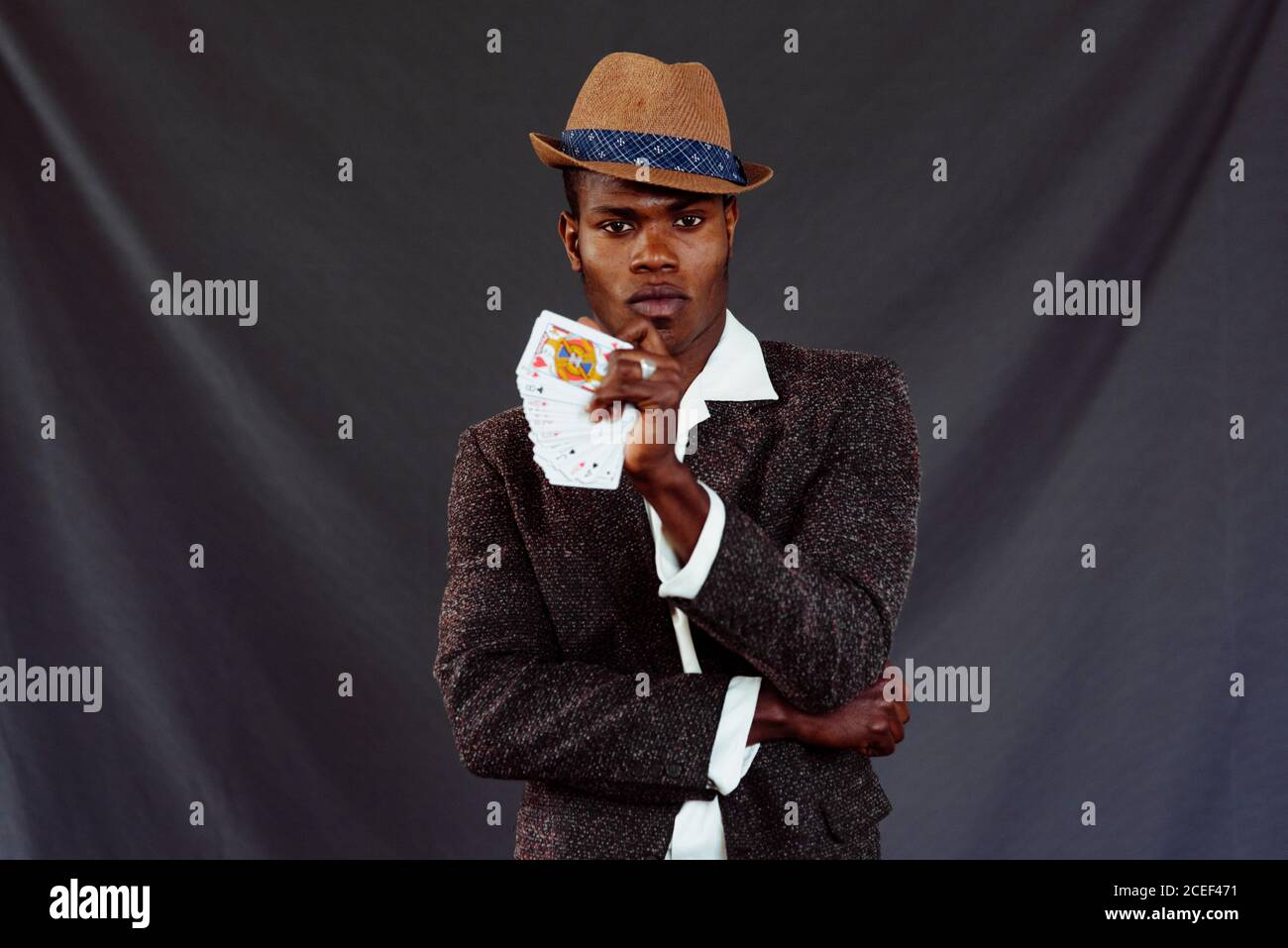 Man playing cards hi-res stock photography and images - Alamy