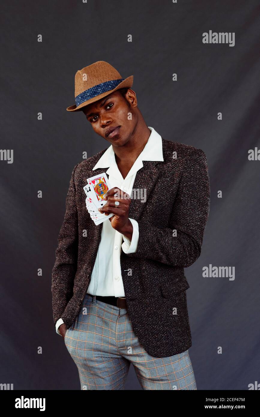 Man playing cards hi-res stock photography and images - Alamy