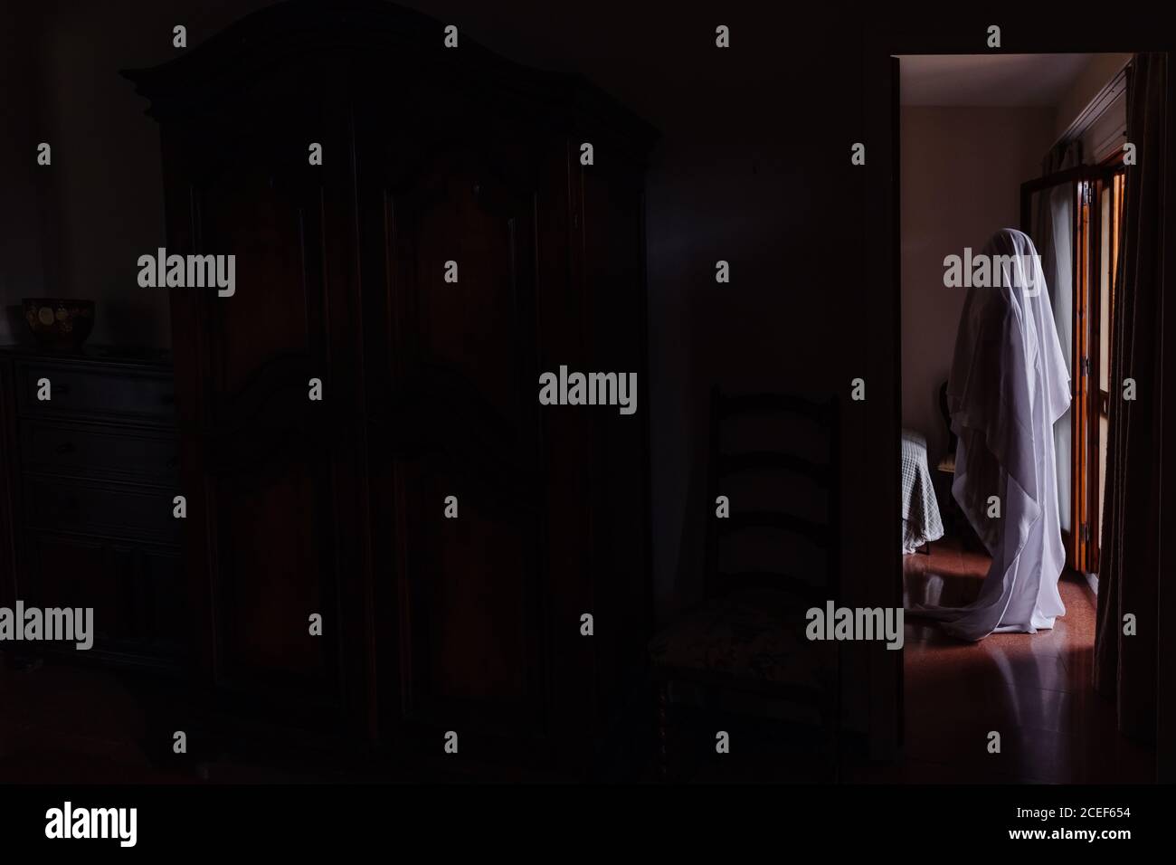 Person disguised as a ghost for Halloween Stock Photo - Alamy