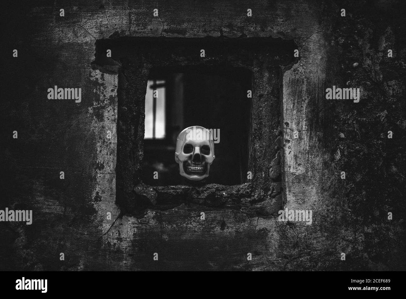 Skull in a window. Decoration for Halloween Stock Photo - Alamy