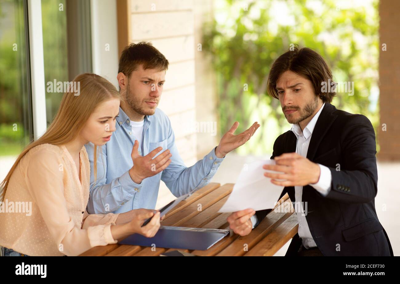 Angry young real estate agent hi-res stock photography and images - Alamy