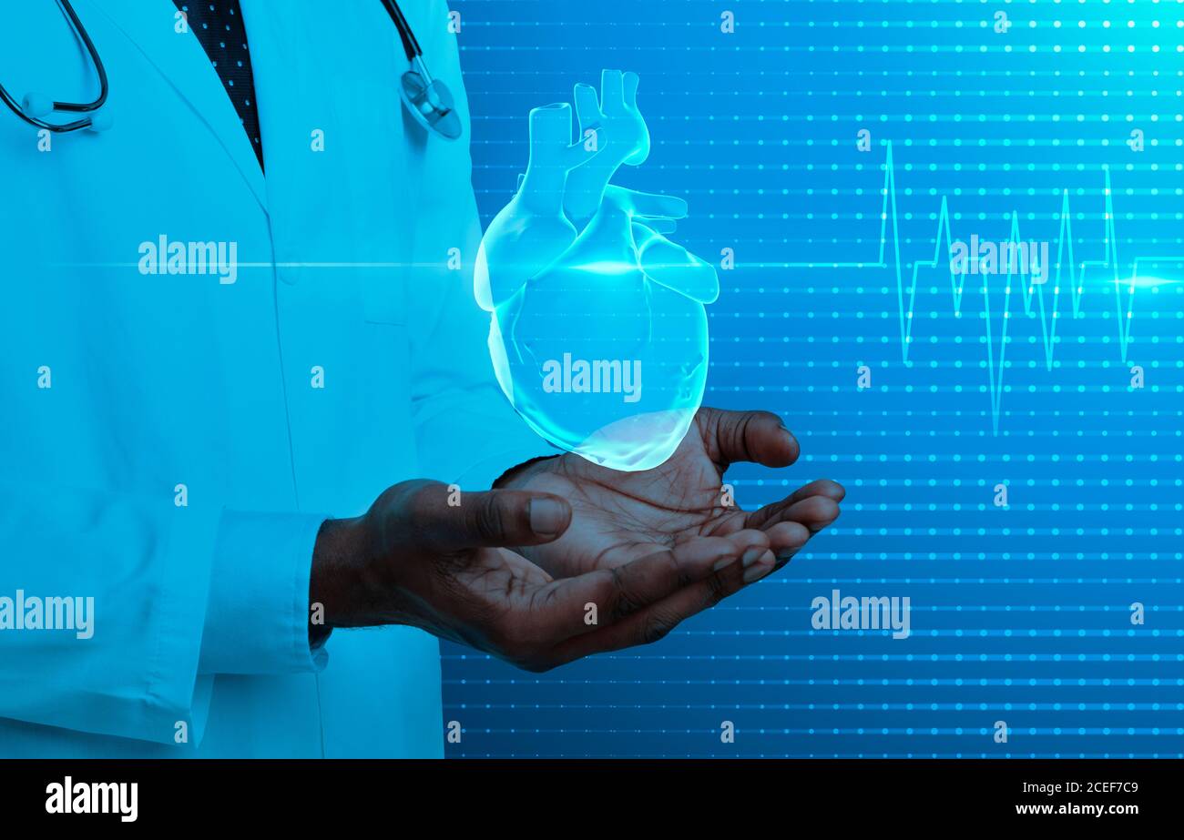 Black medical doctor hands holding human heart Stock Photo - Alamy