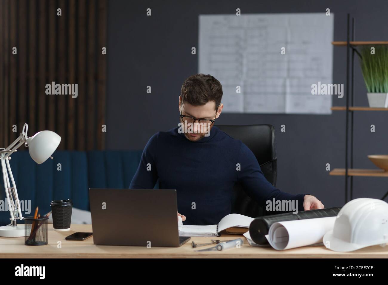 Architect Working In Office With Blueprintsengineer Inspect Architectural Plan Sketching A