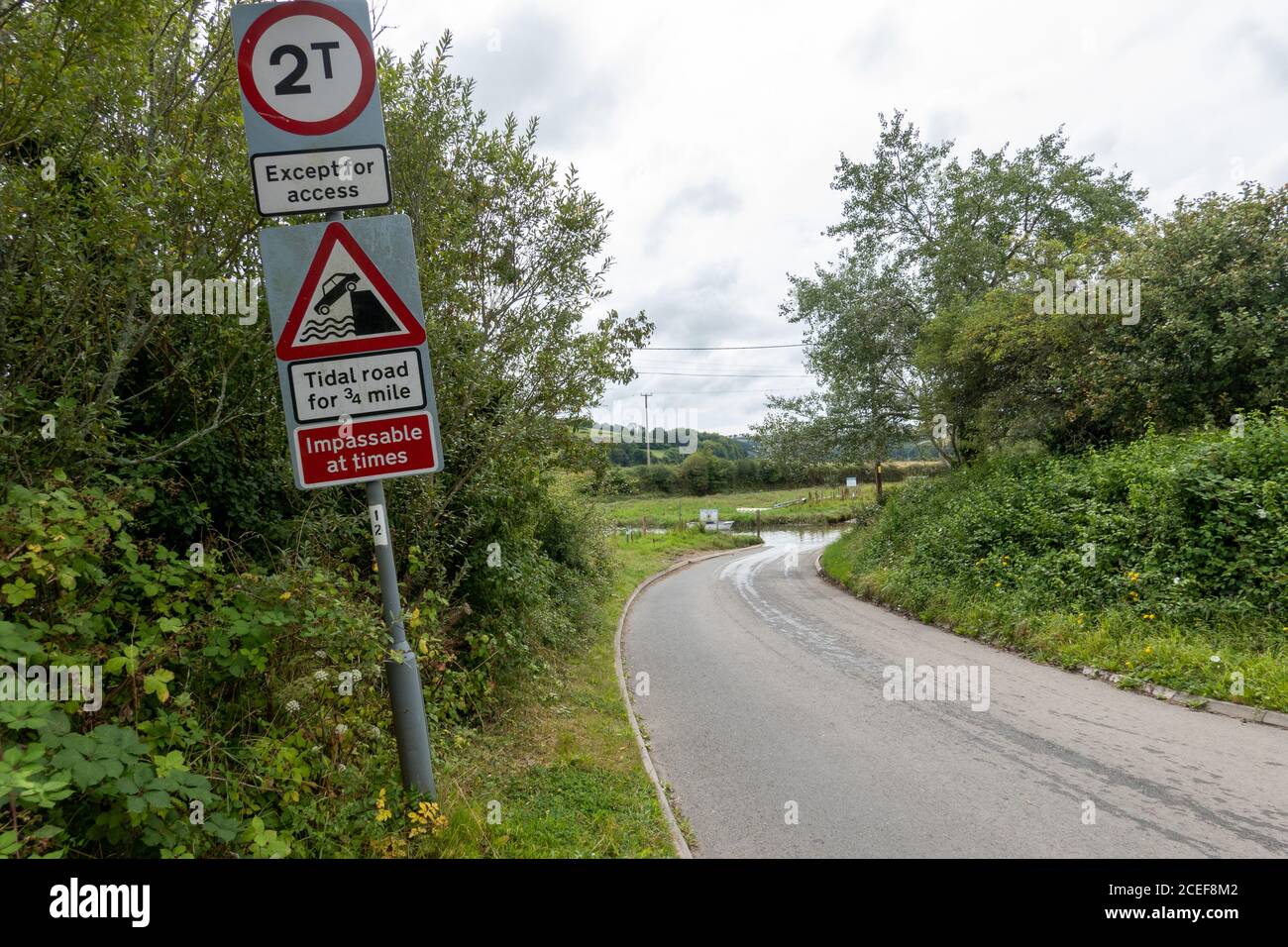 Warning signs, Tidal Road, Aveton Gifford Stock Photo - Alamy