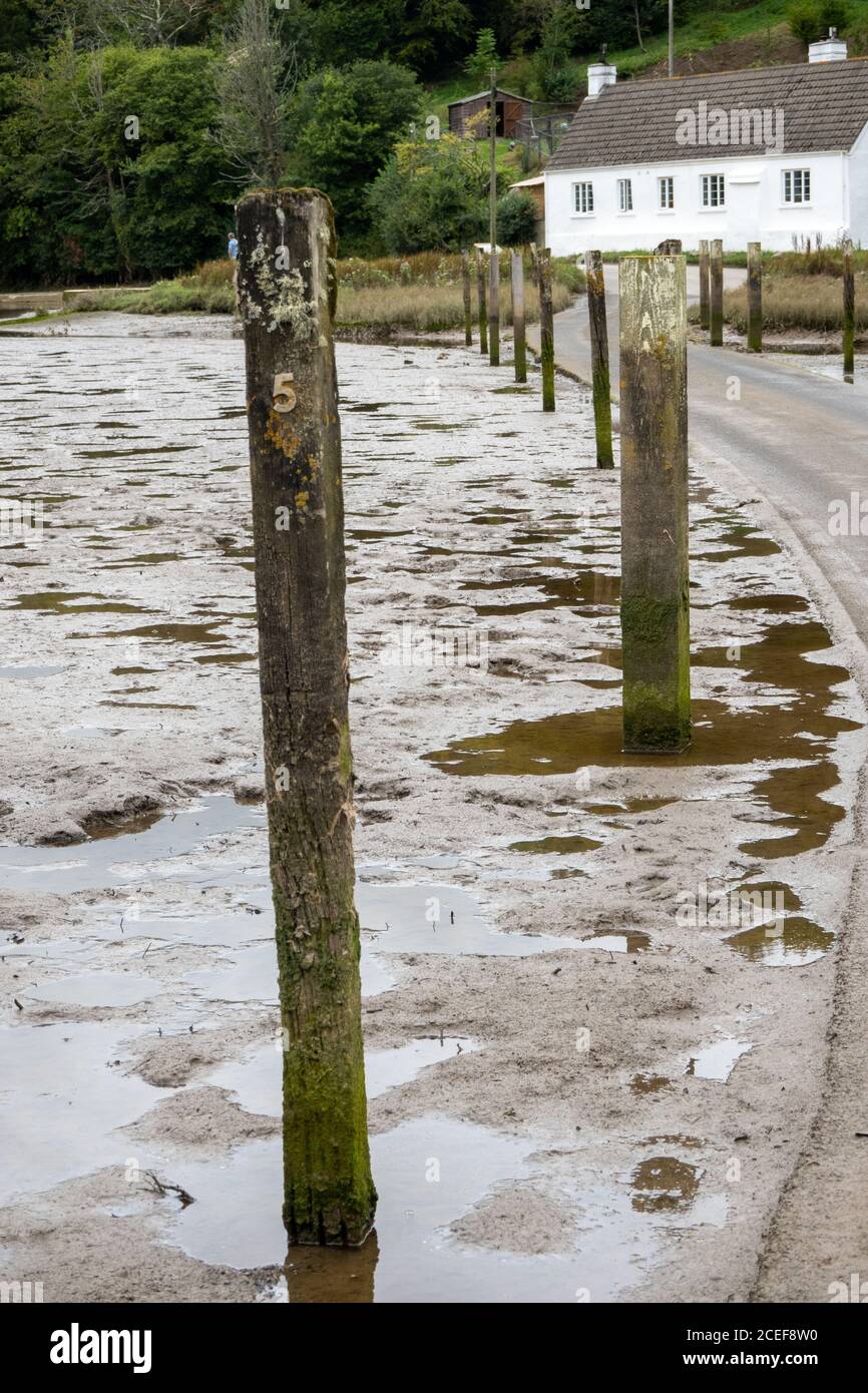 Wooden markers along the Tidal Road, Aveton Gifford Stock Photo - Alamy