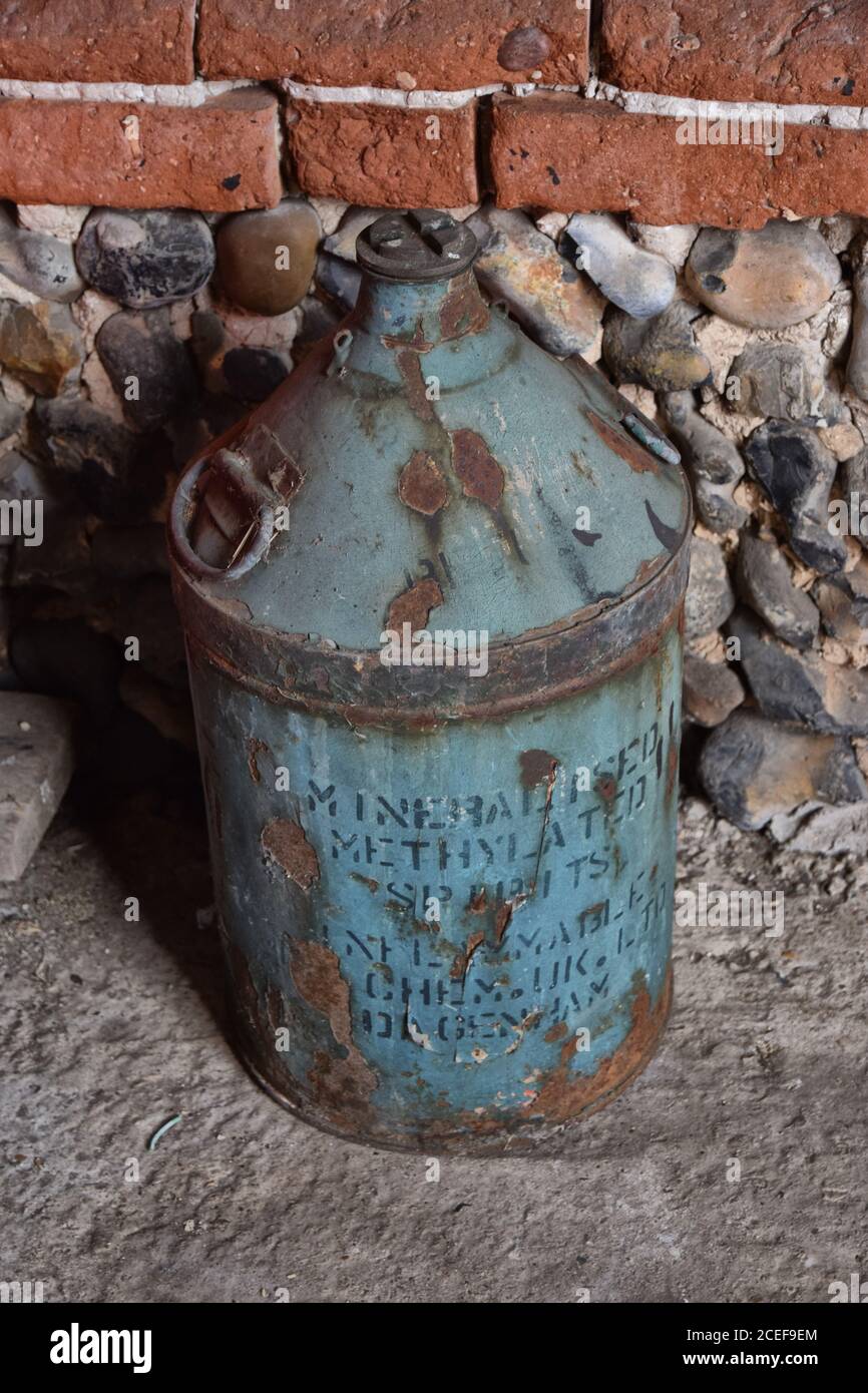 old tin can for methylated spirits Stock Photo - Alamy
