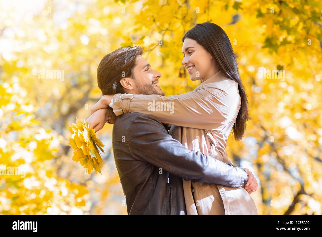 Joyful couple enjoying autumn hi-res stock photography and images - Alamy
