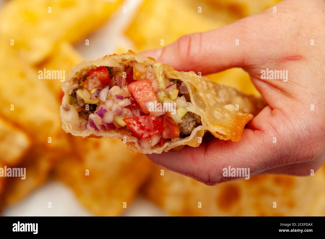 Traditional Brazilian food called PASTEL - Delicious open ground beef ...