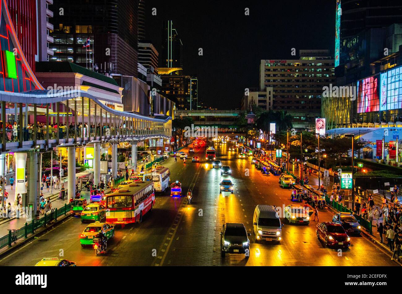 Small night traffic in Bangkok by night. Cars in the motion. Aerial ...