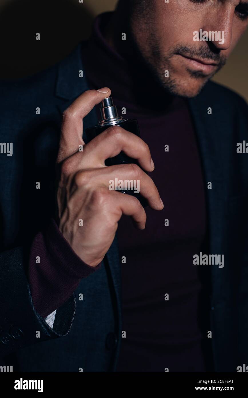 Applying perfume hi-res stock photography and images - Alamy