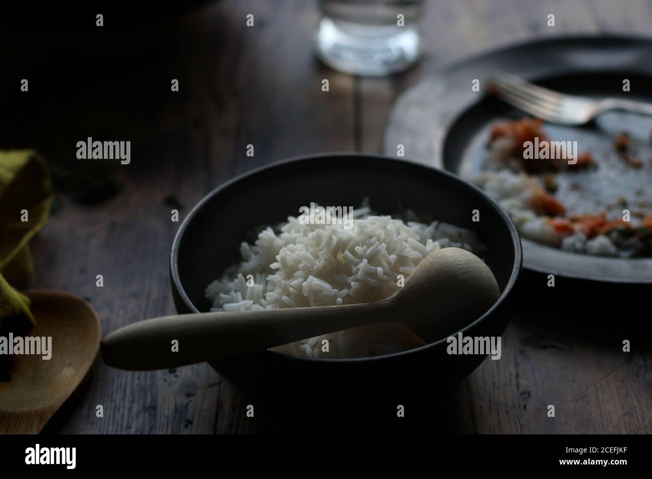 bowl of rice and empty plate Stock Photo - Alamy