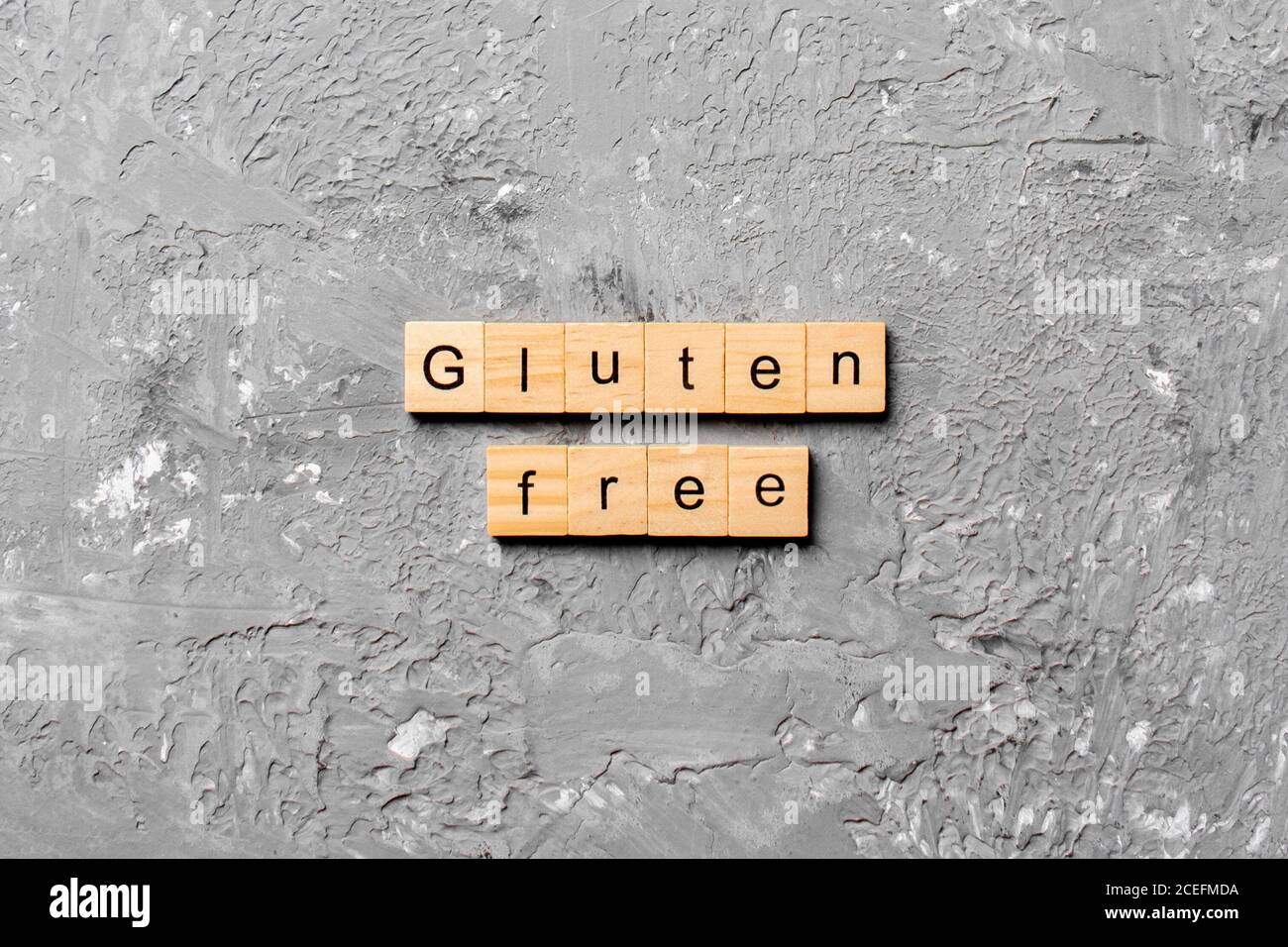 gluten free word written on wood block. gluten free text on table ...