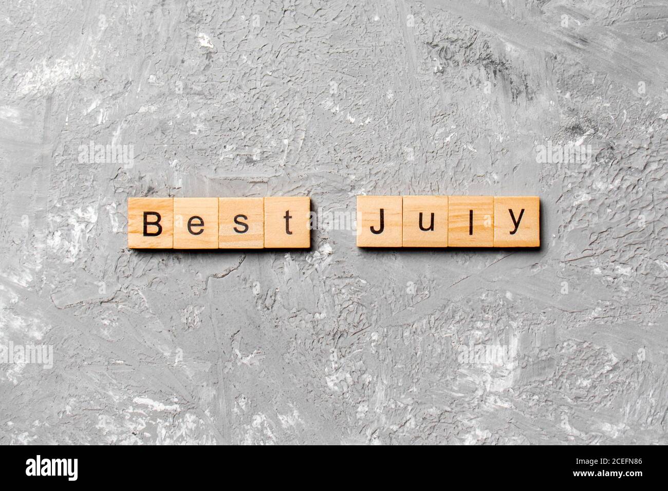 best july word written on wood block. best july text on table, concept ...