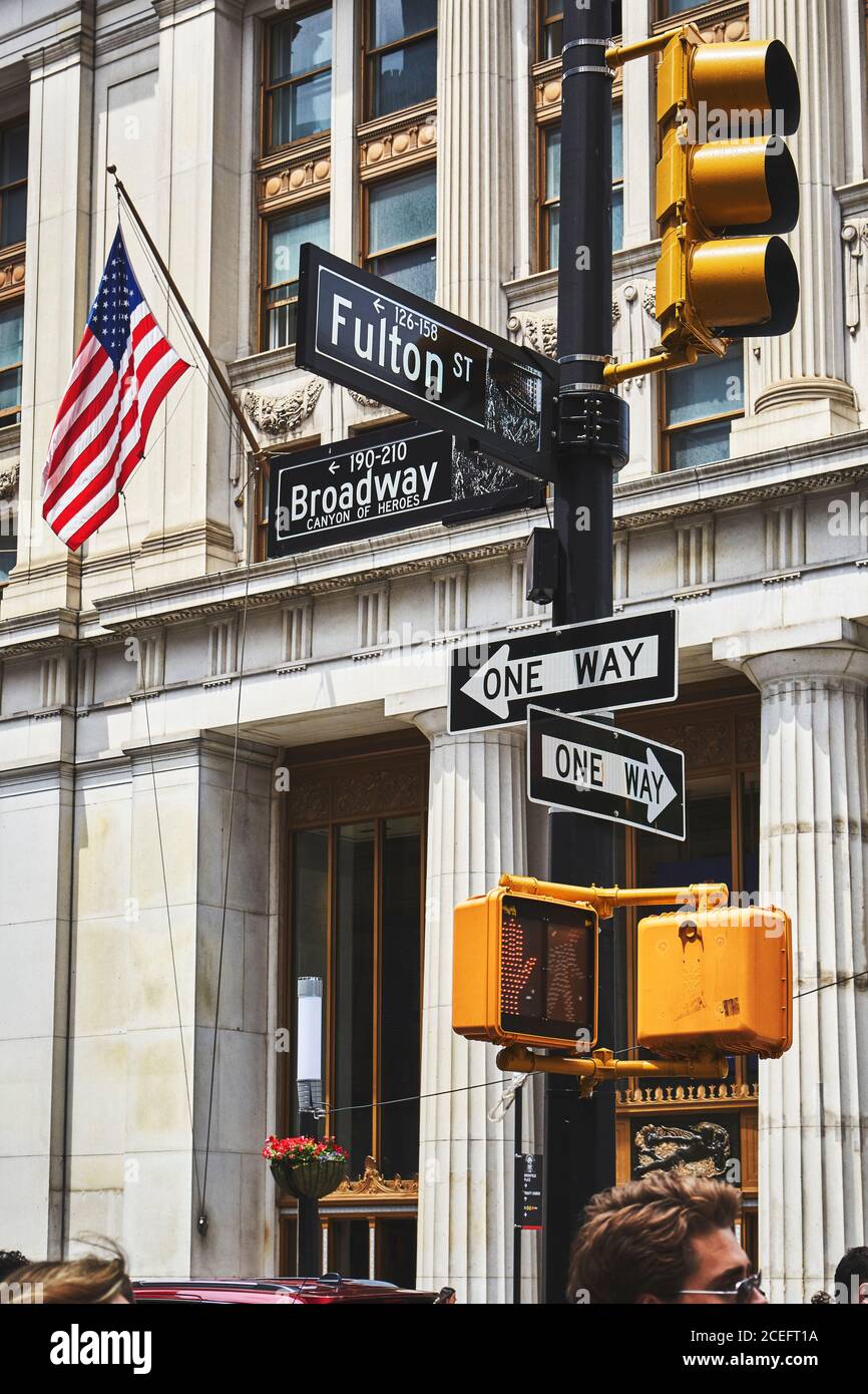 Sign post and traffic lights in downtown Stock Photo - Alamy
