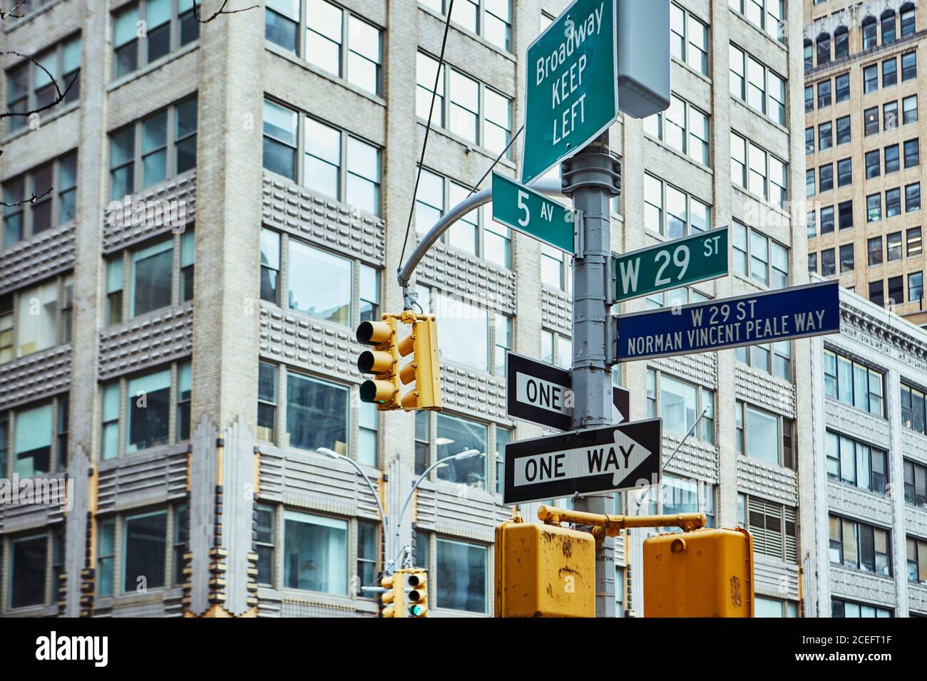 Sign post and traffic lights in downtown Stock Photo - Alamy