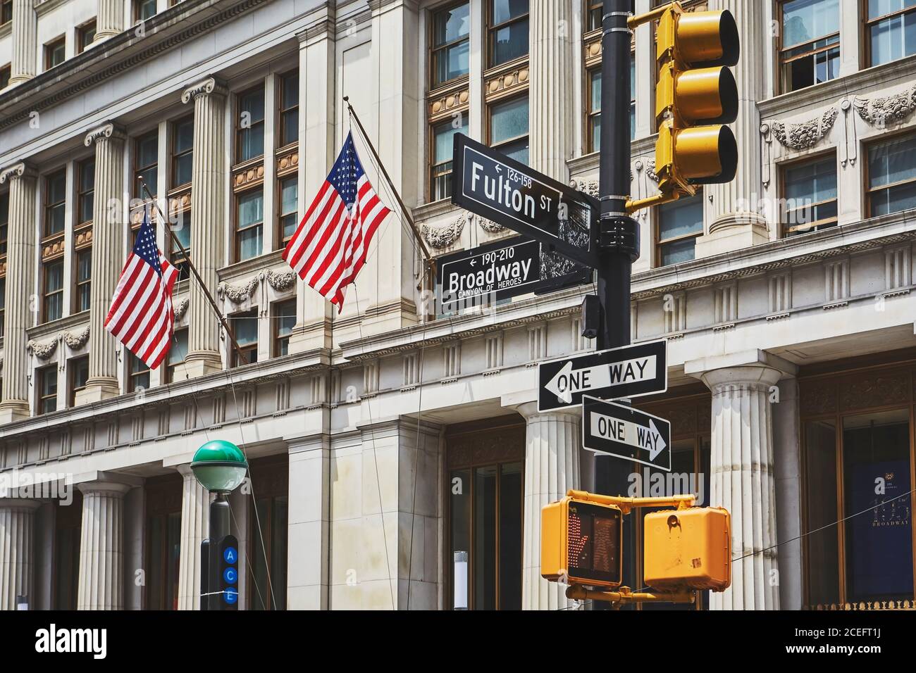 Sign post and traffic lights in downtown Stock Photo - Alamy