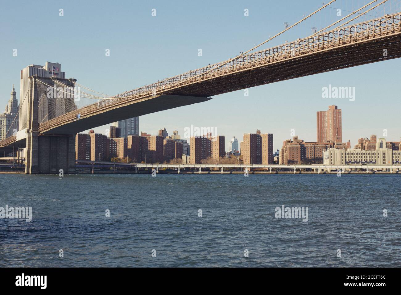 View to big concrete bridge and different skyscrapers in New York city ...