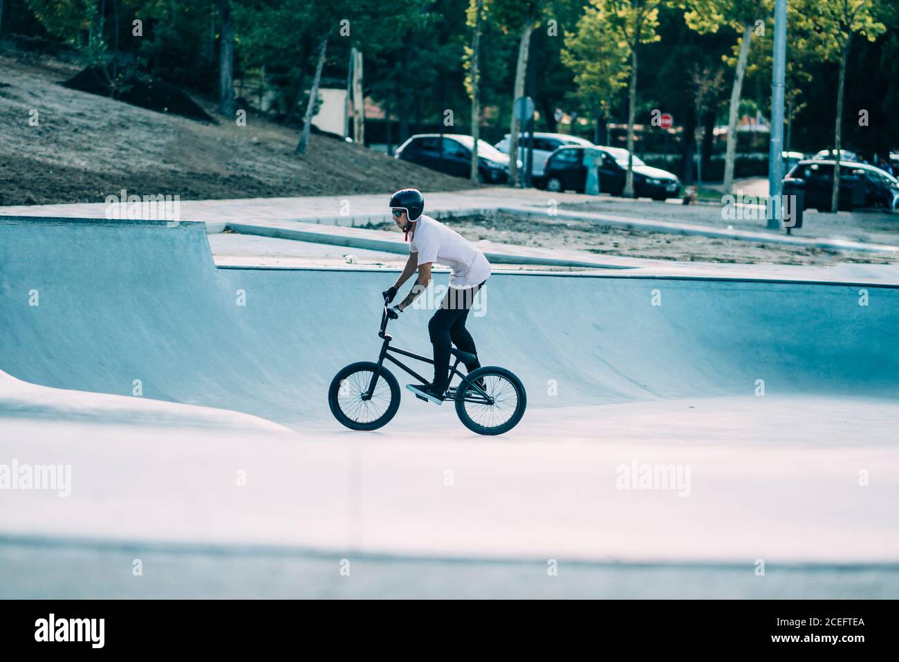 man riding bicycle on springboard Stock Photo - Alamy
