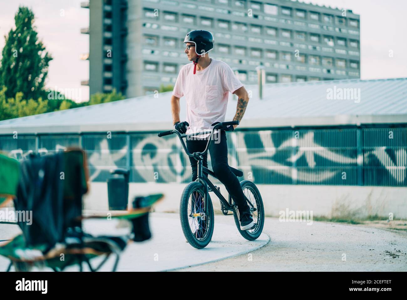 man riding bicycle on springboard Stock Photo - Alamy
