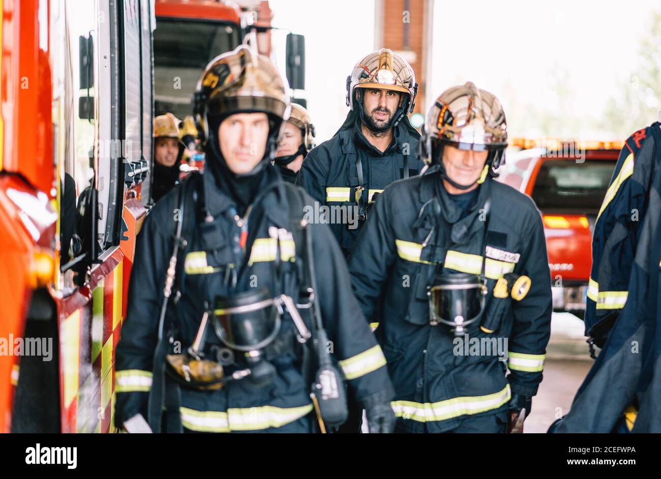 Firemen working at fire station Stock Photo - Alamy