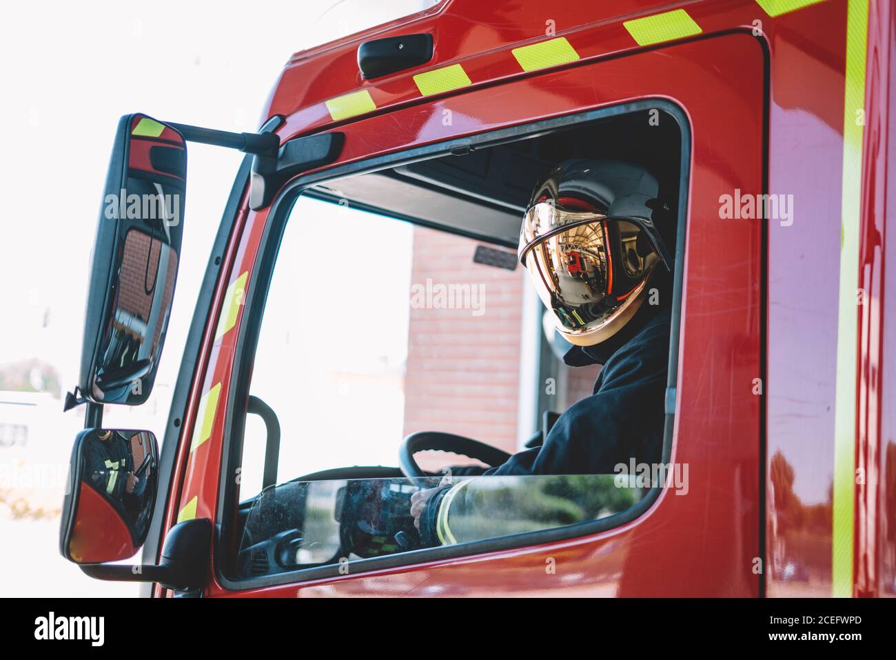 Fire man driving hi-res stock photography and images - Alamy