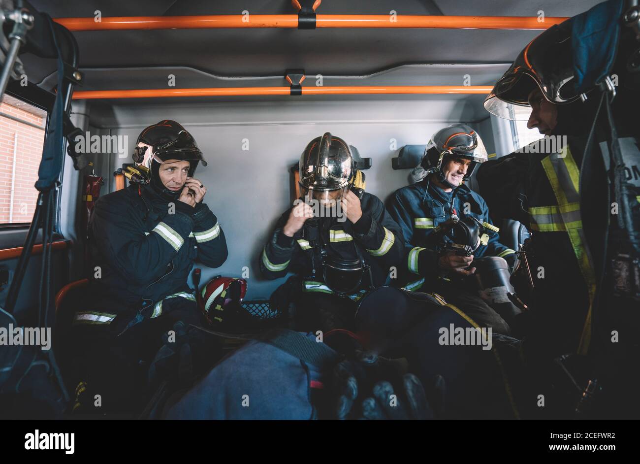Fire truck inside fire department hi-res stock photography and images ...