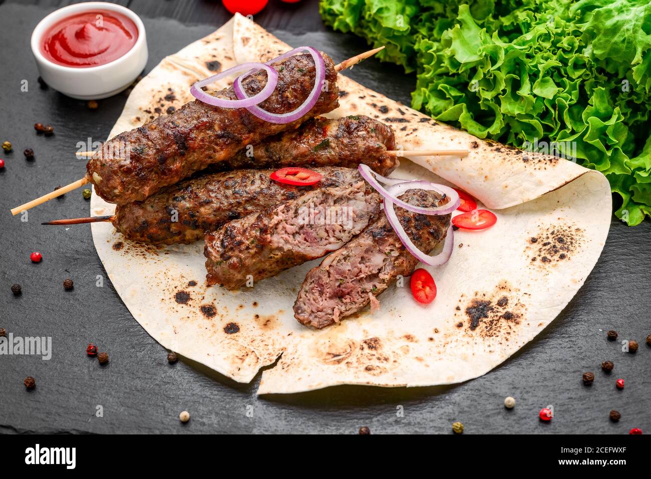 lula kebab with potatoes, vegetables and sauce Stock Photo - Alamy