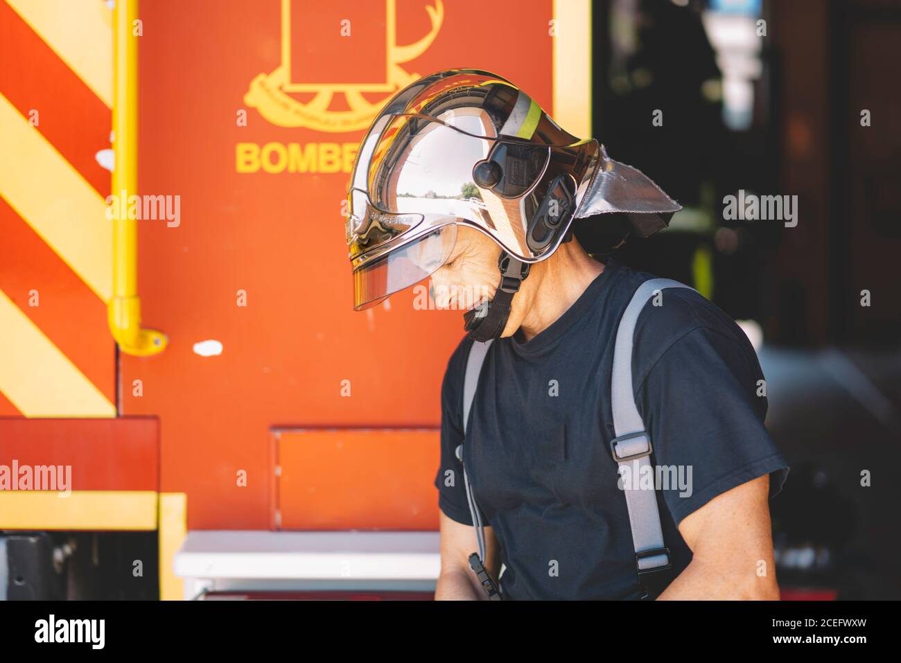 Firemen working on fire engine hi-res stock photography and images - Alamy