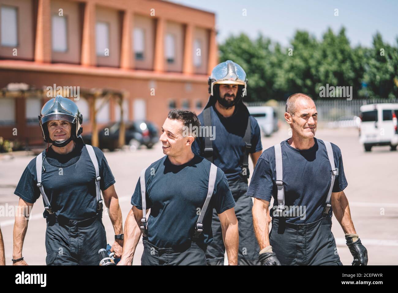 Firemen working at fire station Stock Photo - Alamy