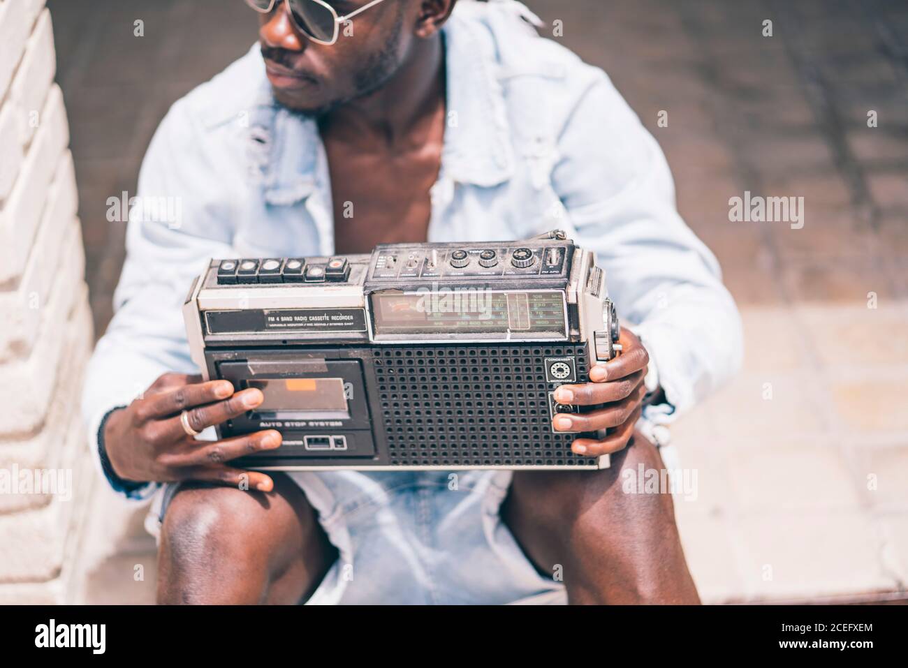 Radio cassette black man hi-res stock photography and images - Alamy