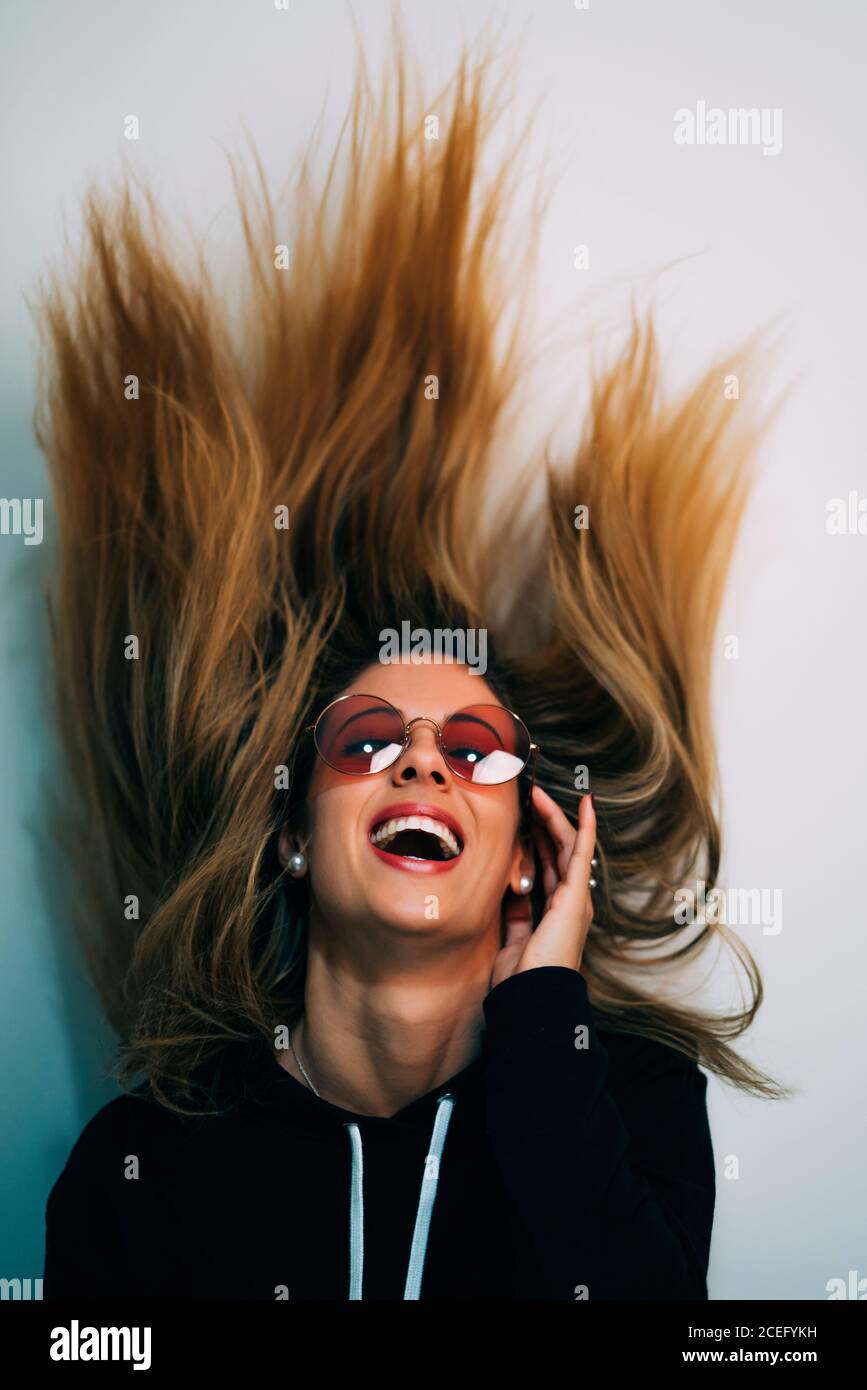 Joyful singing young woman hi-res stock photography and images - Alamy