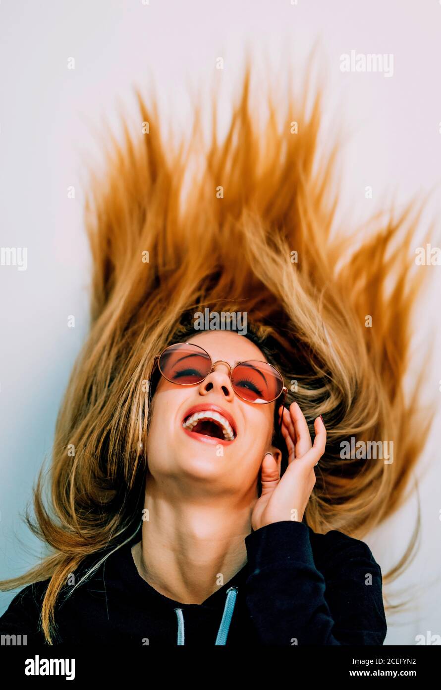 Woman long hair dancing smiling hi-res stock photography and images - Alamy