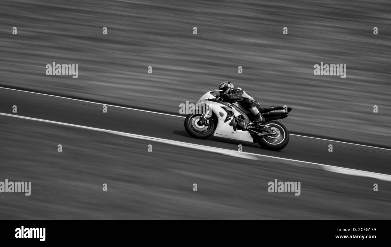 Motorbike wheelie Black and White Stock Photos & Images - Alamy