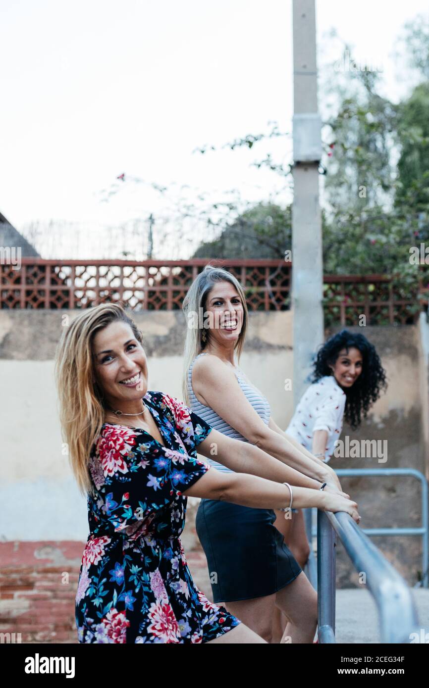 Three girls playing outdoor hi-res stock photography and images - Alamy