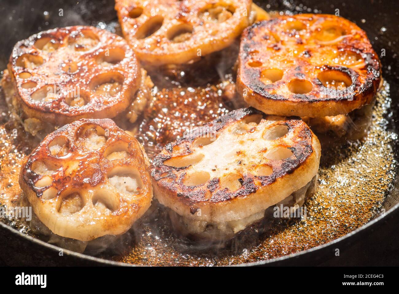 Cooking lotus root meat stuffed sandwiches Stock Photo - Alamy