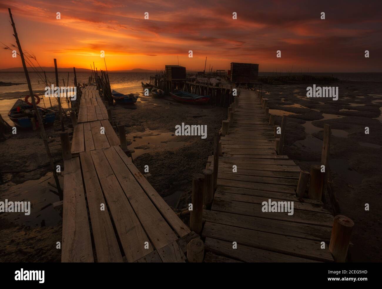 Old pier on sunset Stock Photo - Alamy