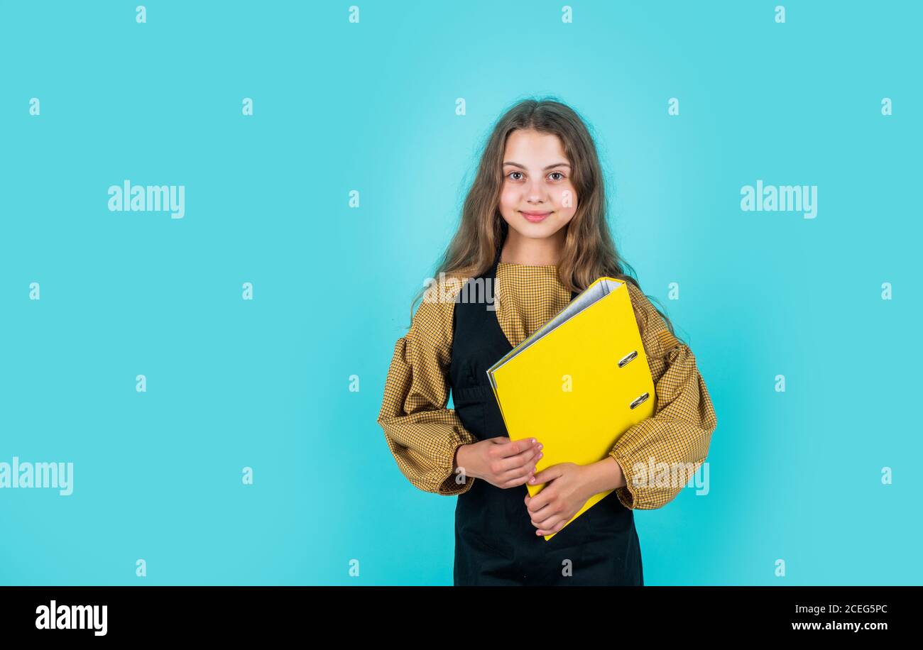 teen girl hold folder with documents. back to school. kid presenting ...