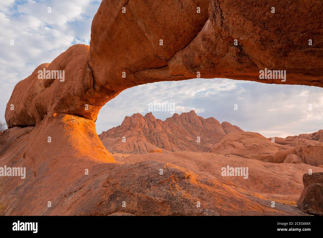 Stone arch in desert Stock Photo - Alamy