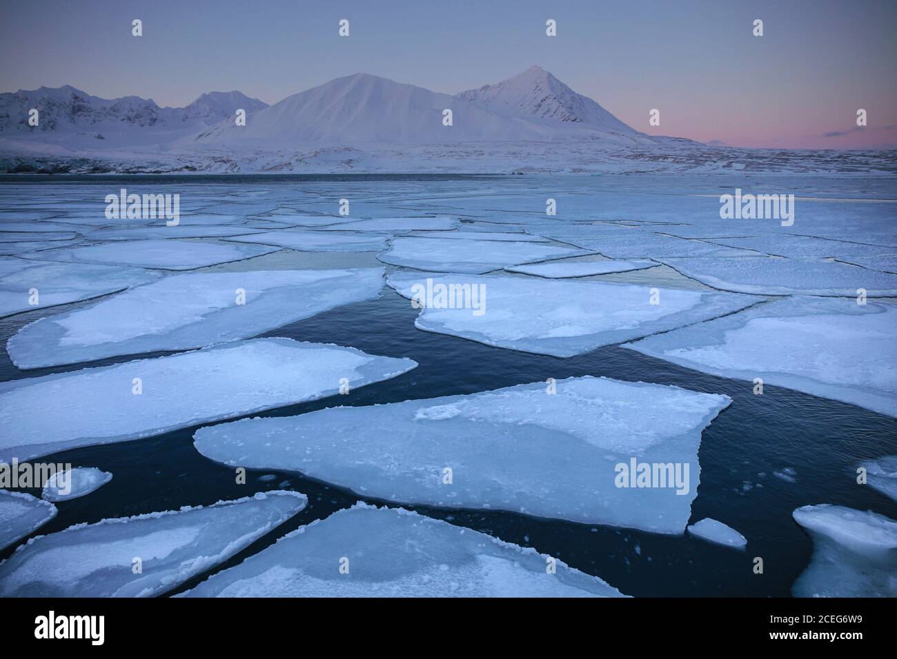 Huge ice blocks on water Stock Photo - Alamy