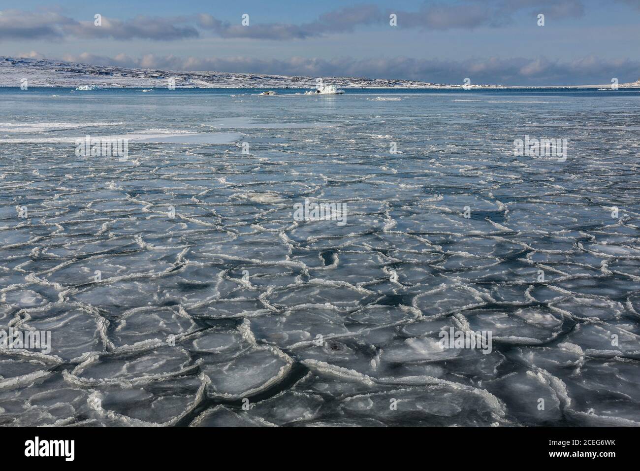 Huge ice blocks on water Stock Photo - Alamy